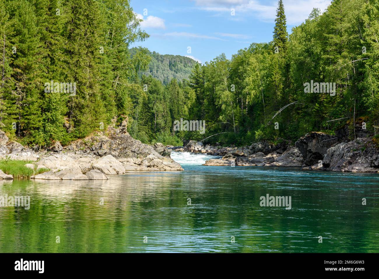 Rapid flow of mountain river water Stock Photo - Alamy