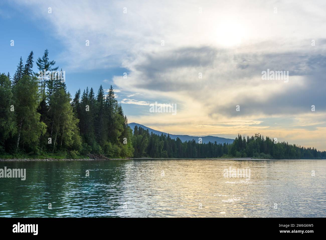 Daytime landscape with river, forest and mountains Stock Photo - Alamy