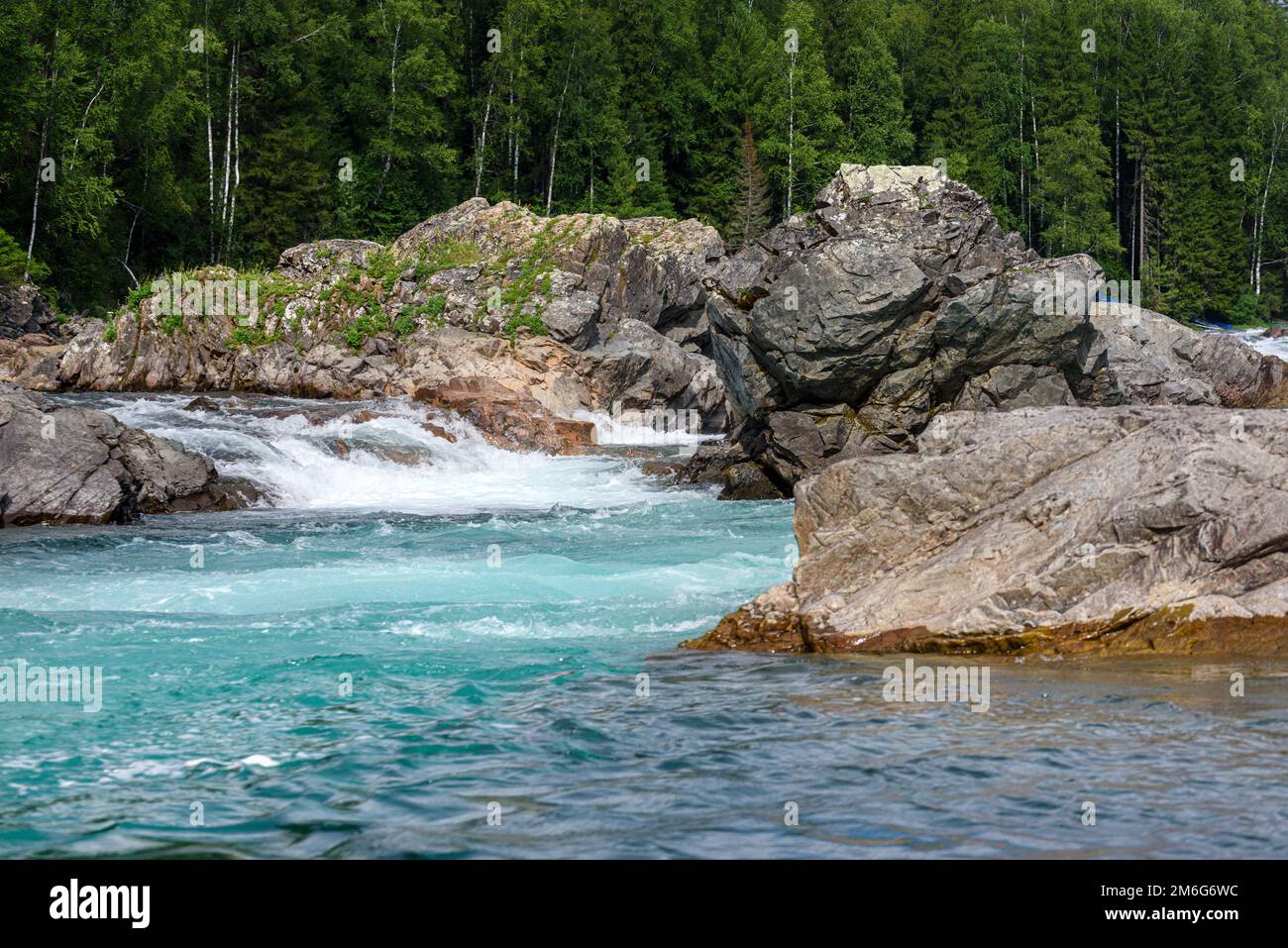 Rapid flow of mountain river water Stock Photo - Alamy