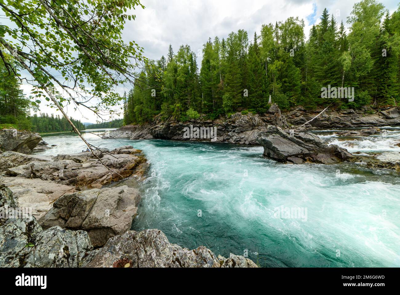 Rapid flow of mountain river water Stock Photo - Alamy