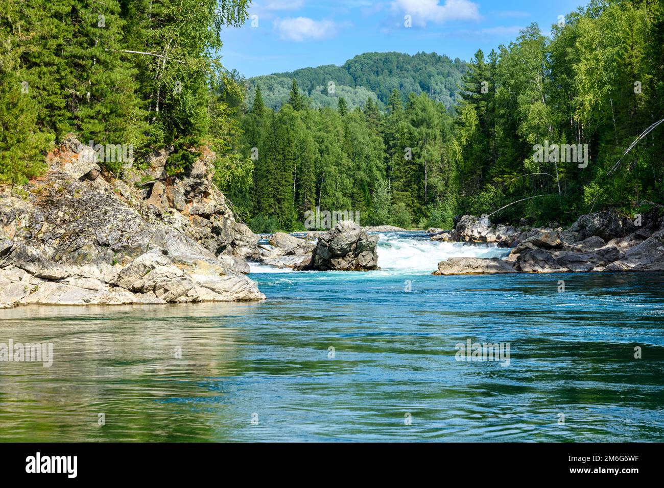 Rapid flow of mountain river water Stock Photo - Alamy