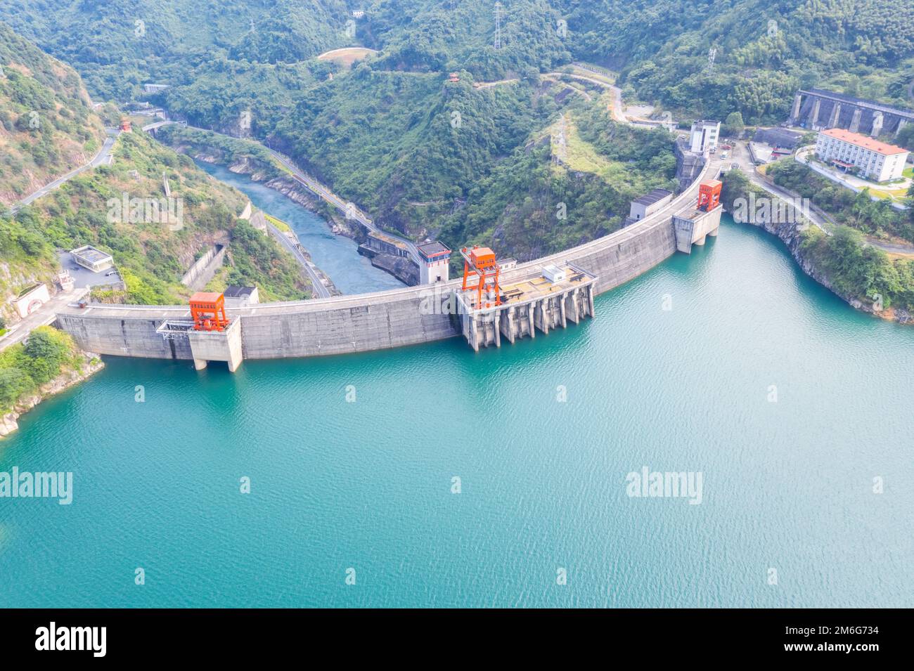 Small hydroelectric station, dam and reservoir closeup Stock Photo - Alamy