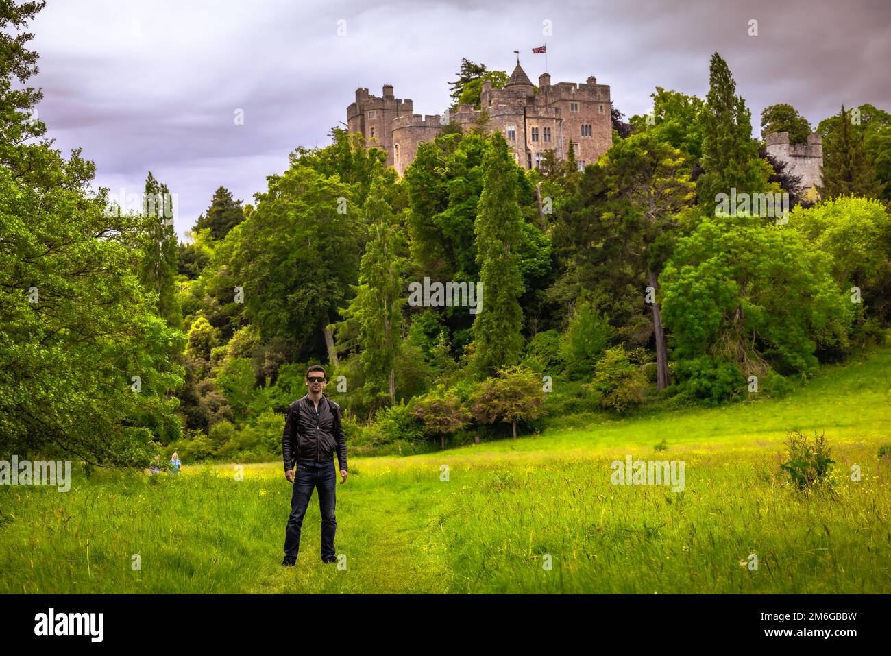 Dunster - May 29 2022: Medieval castle of the old rural town of Dunster ...