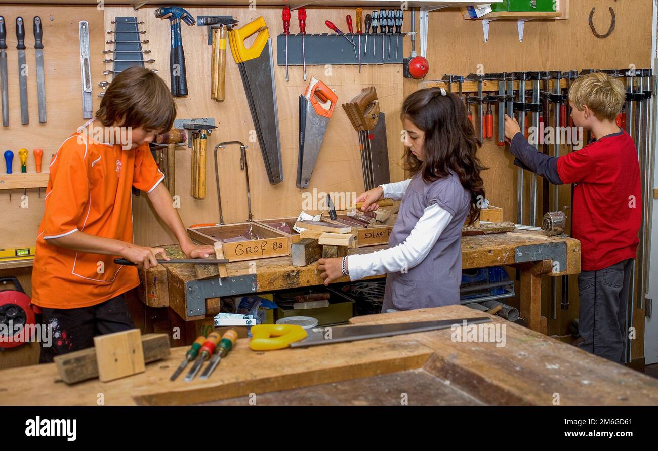 Netherlands, sawing, carpentry and gluing are part of the craft lessons ...
