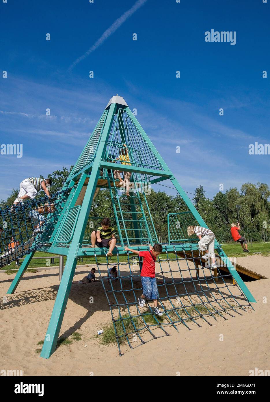Netherlands, children on a climbing frame pyramid in playground Stock ...
