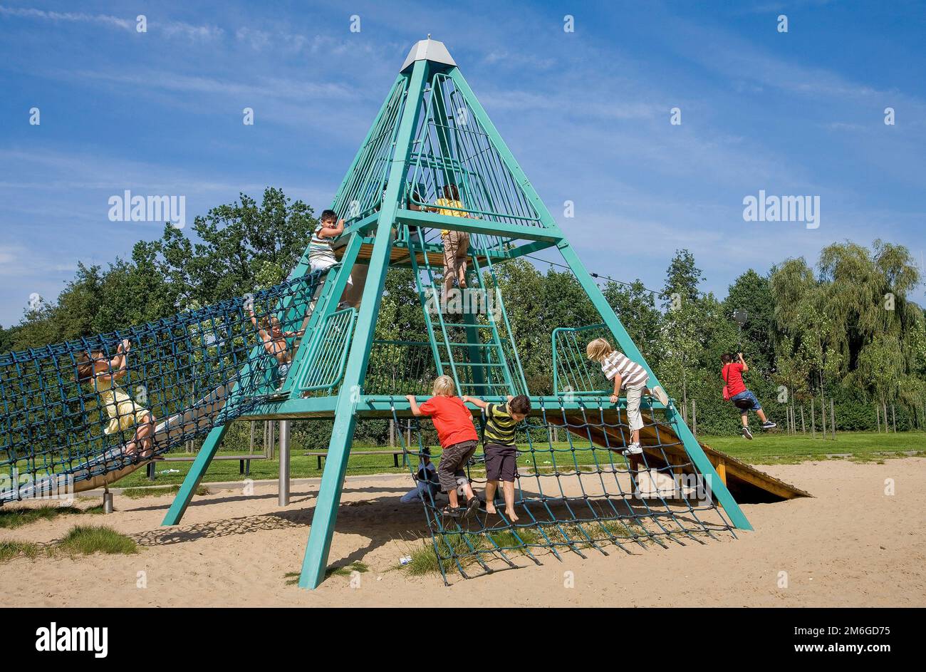 Netherlands, children on a climbing frame pyramid in playground Stock ...