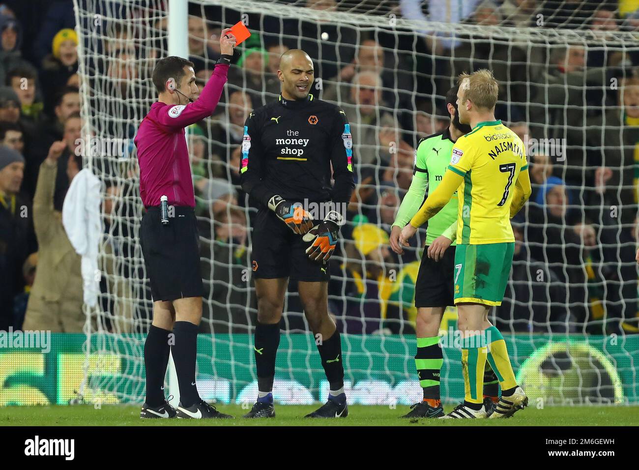 Carl Ikeme of Wolverhampton Wanderers receives a red card for a foul on ...