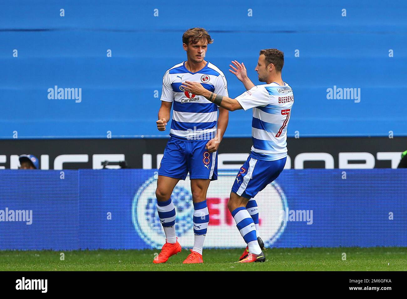 John Swift (left) of Reading celebrates after scoring the opening goal ...