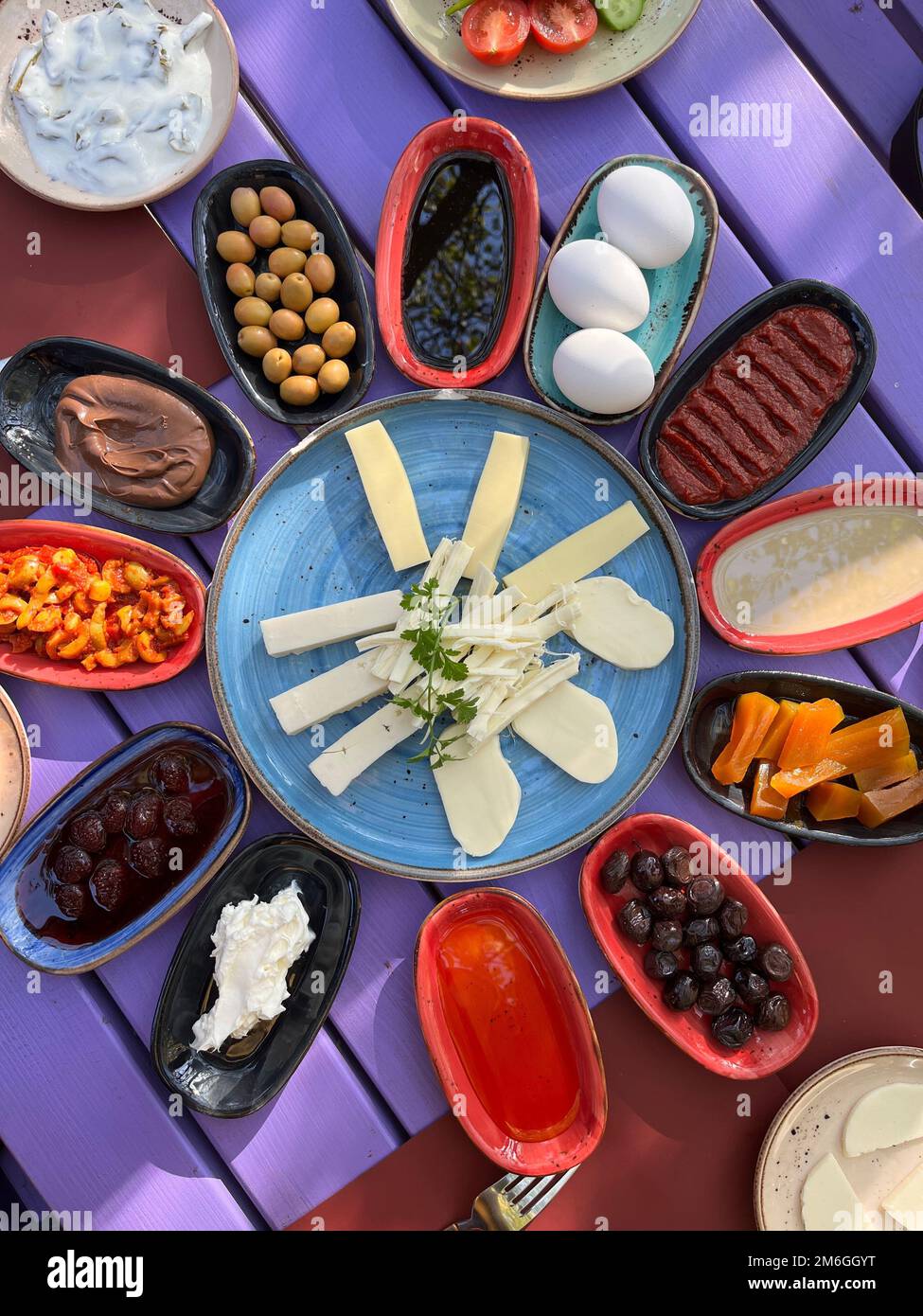 The famous Turkish breakfast, various plates, olives, cheese, eggs ...