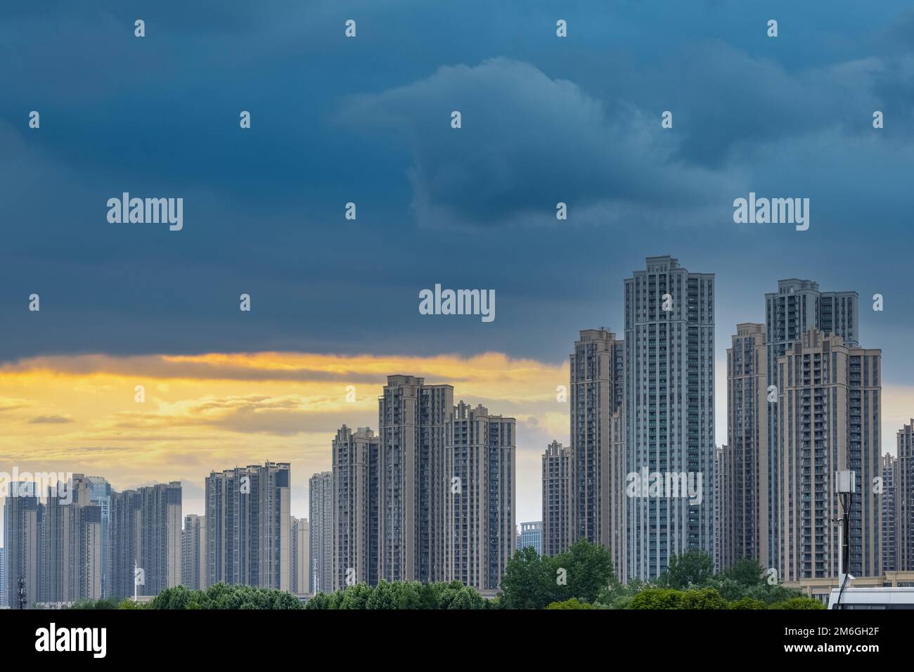 New residential buildings against a dusk sky Stock Photo - Alamy