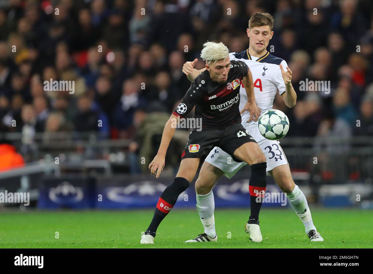 Kevin Kampl of Bayer Leverkusen and Ben Davies of Tottenham Hotspur ...