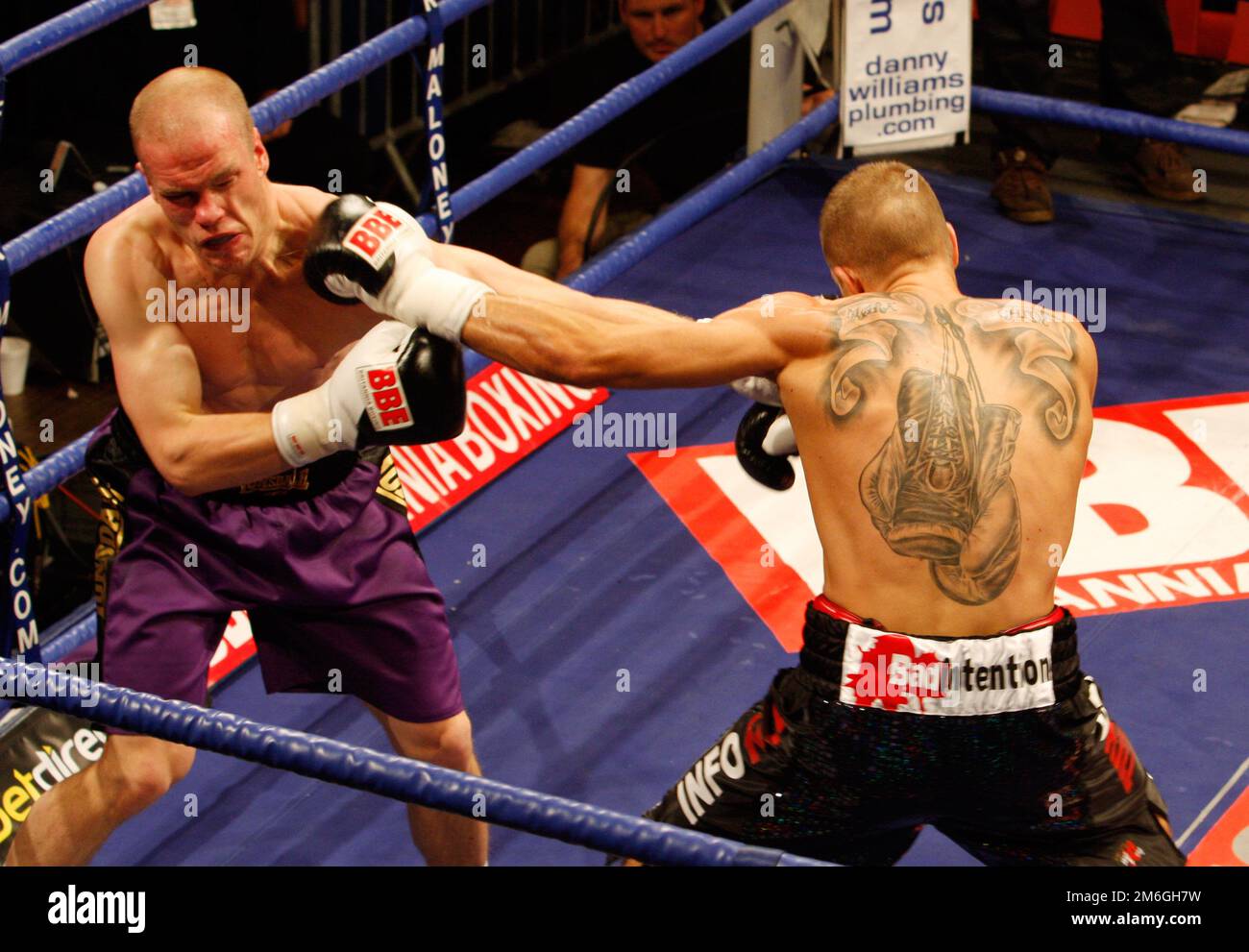 Boxers fight during the undercard of Ian Napa of England versus Carmelo ...