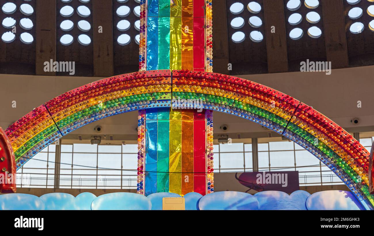 Rainbow Arch Ride Amusement Park in Expo Hall Stock Photo - Alamy