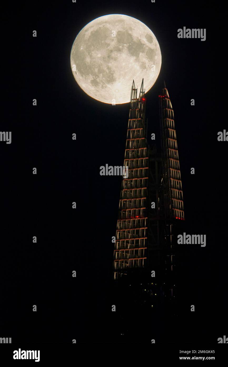 A superman rises over the tip of the Shard skyscraper Stock Photo - Alamy