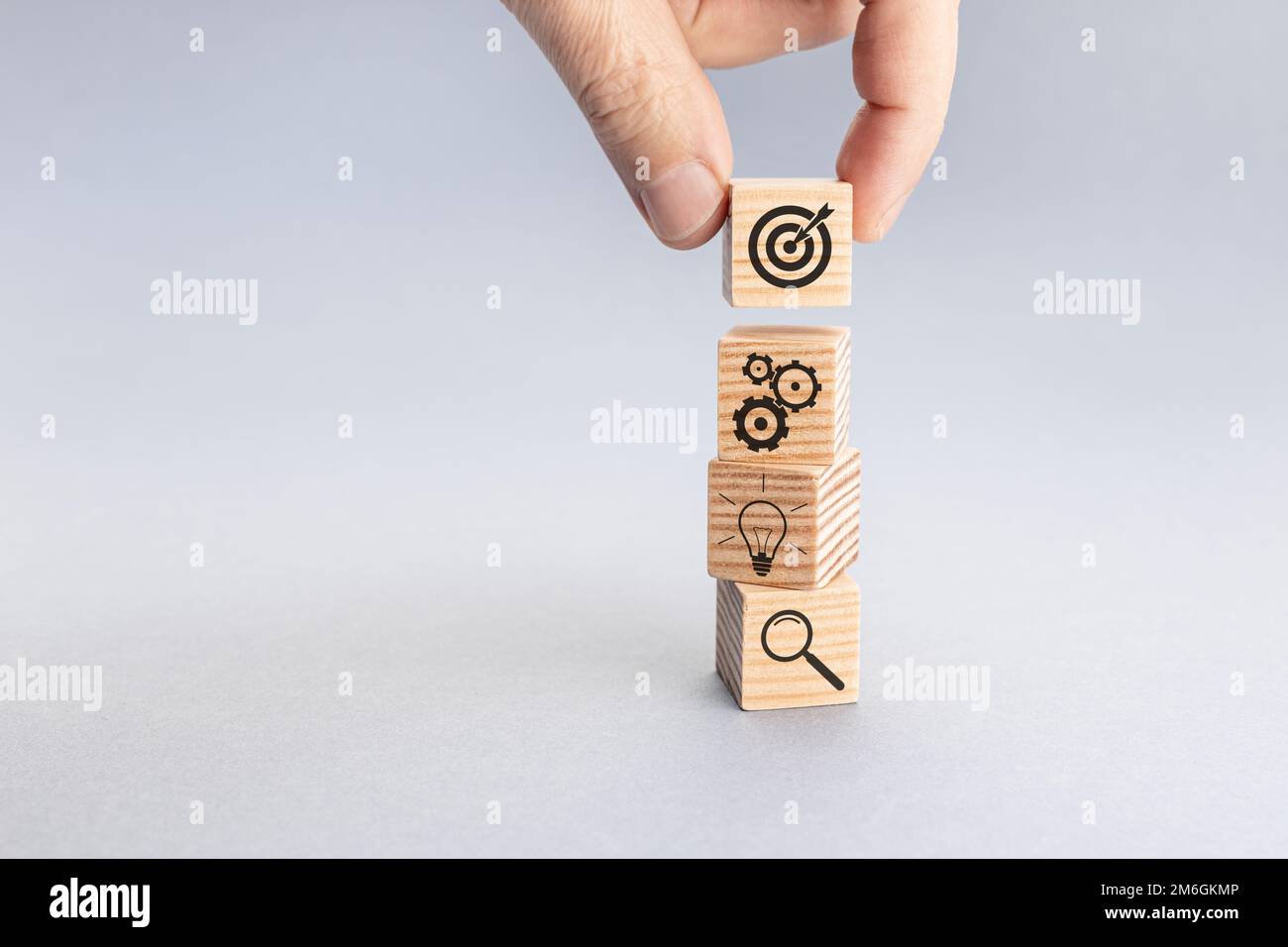 Business achievement goal and objective target concept. Hand putting ...