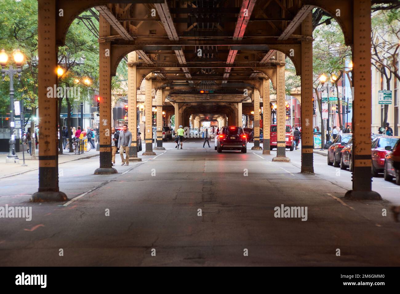 A view under the iconic L train tracks in chicago crossing LaSalle ...