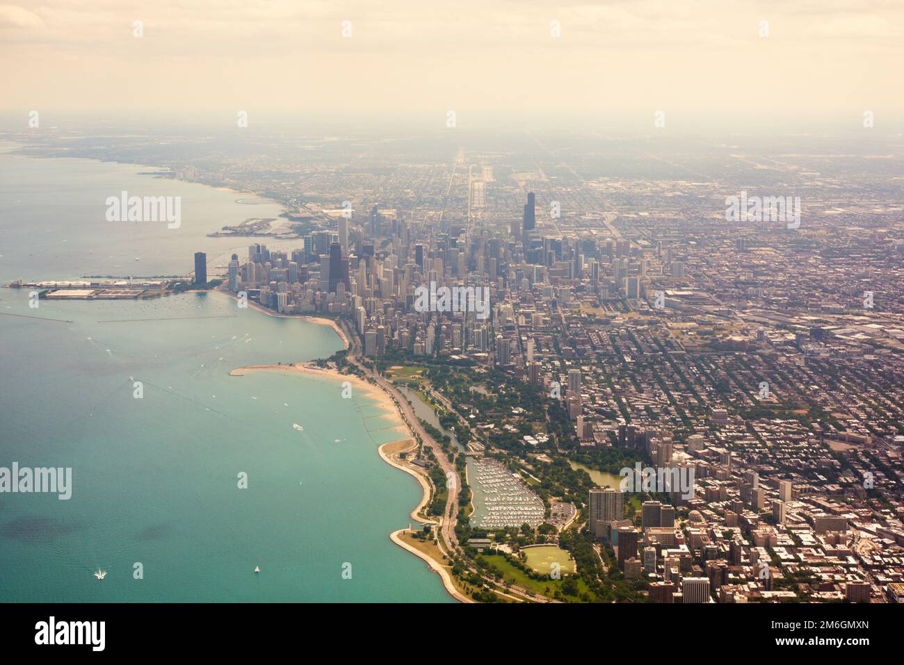 A view of Chicago city skyline seen from the air in flight coming in to ...
