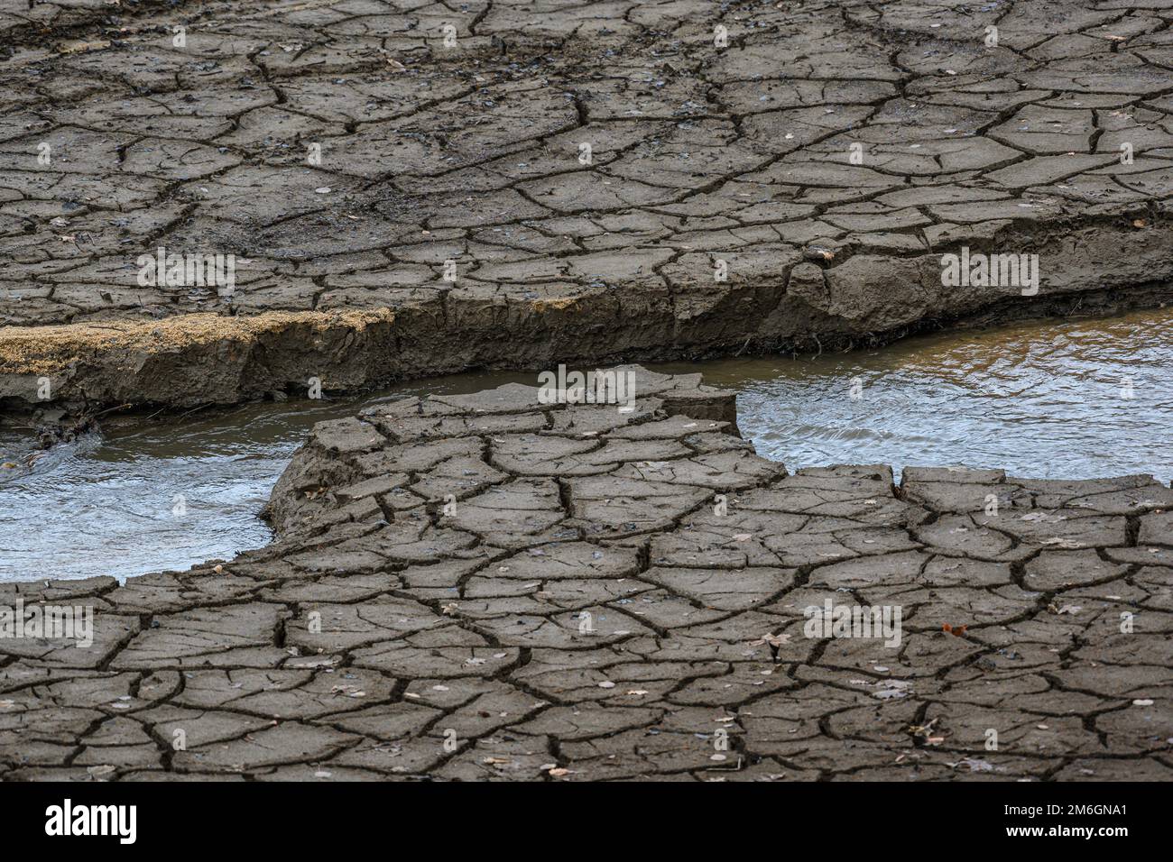 Dry bottom of the dam in Liberec - Harcov with cracked mud Stock Photo ...