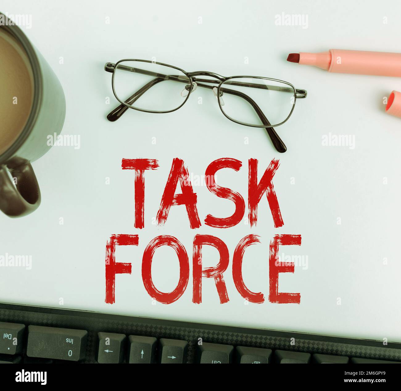 Sign displaying Task Force. Word Written on a group of people who are ...