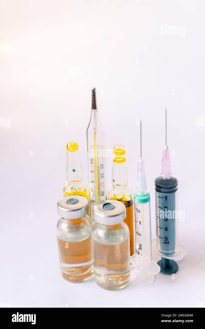 Various medical equipment, thermometer, ampoules, pipette, drugs ...