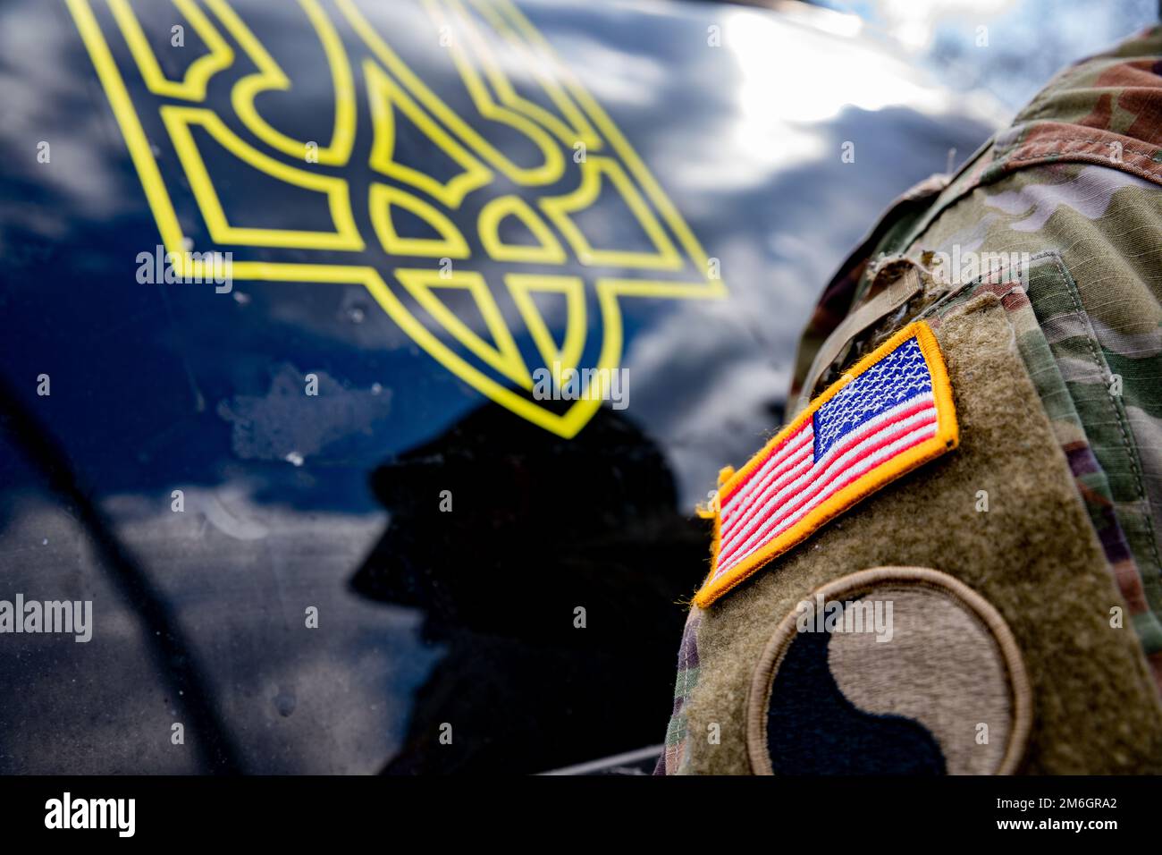 An American flag patch of a Connecticut Army National Guard soldier is ...