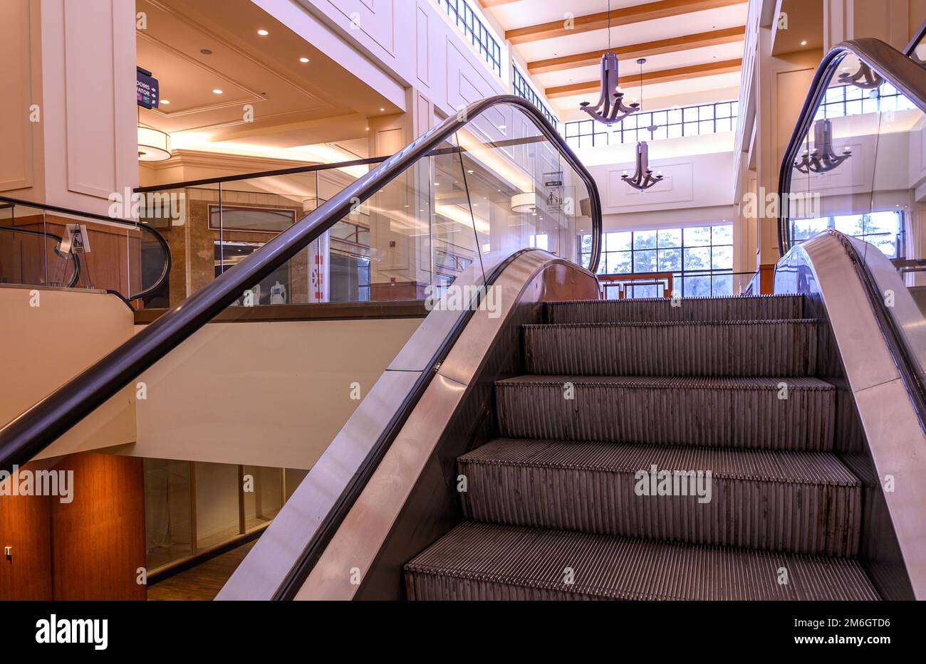 Escalators in a closed down shopping mall Stock Photo - Alamy