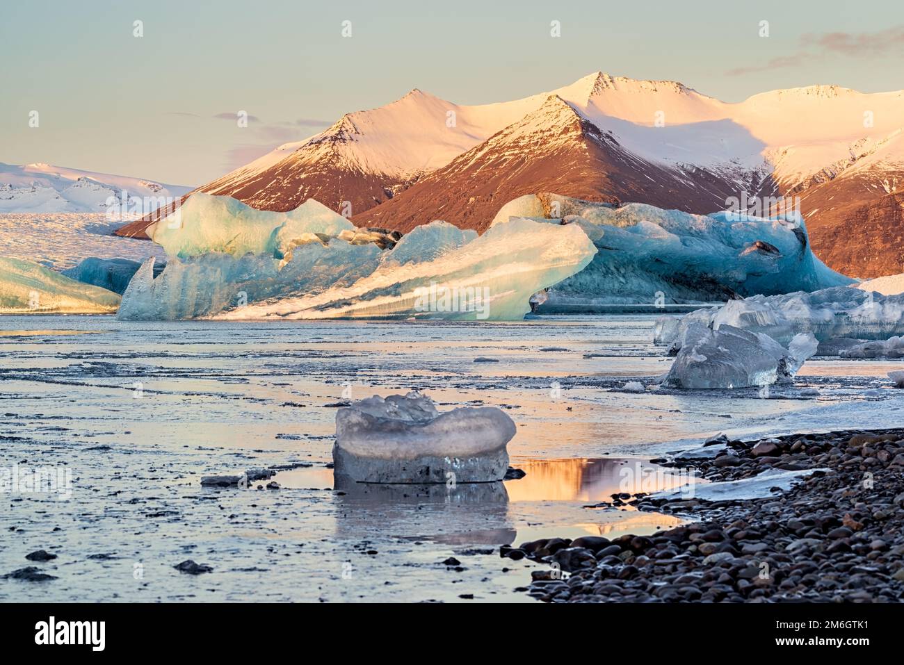 Icebergs at sunrise in the arctic sea hi-res stock photography and ...