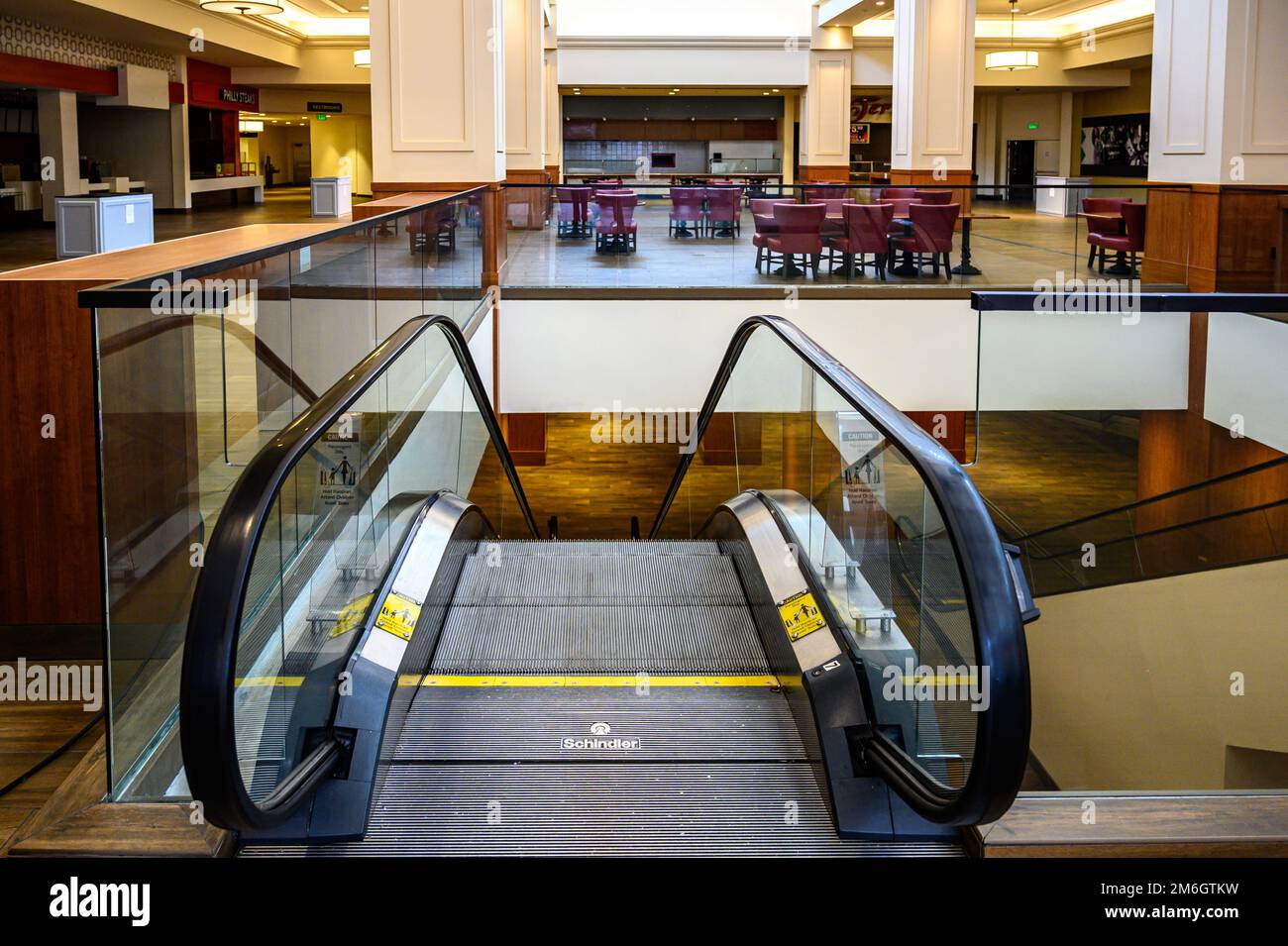 Escaloators in a closed down shopping mall Stock Photo - Alamy