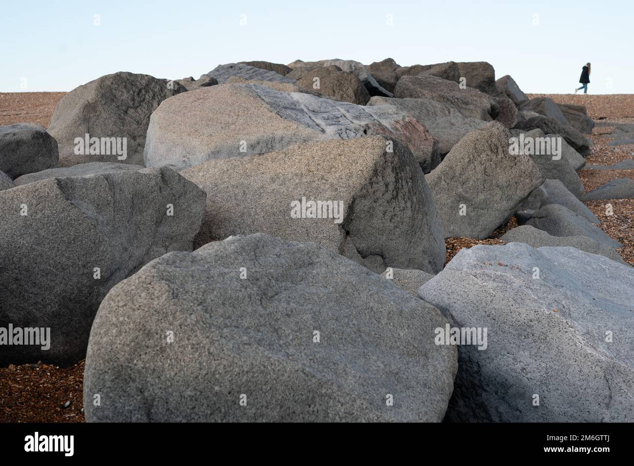 Water breaking rocks in the coastal town of Shoreham in Sussex. Photo ...