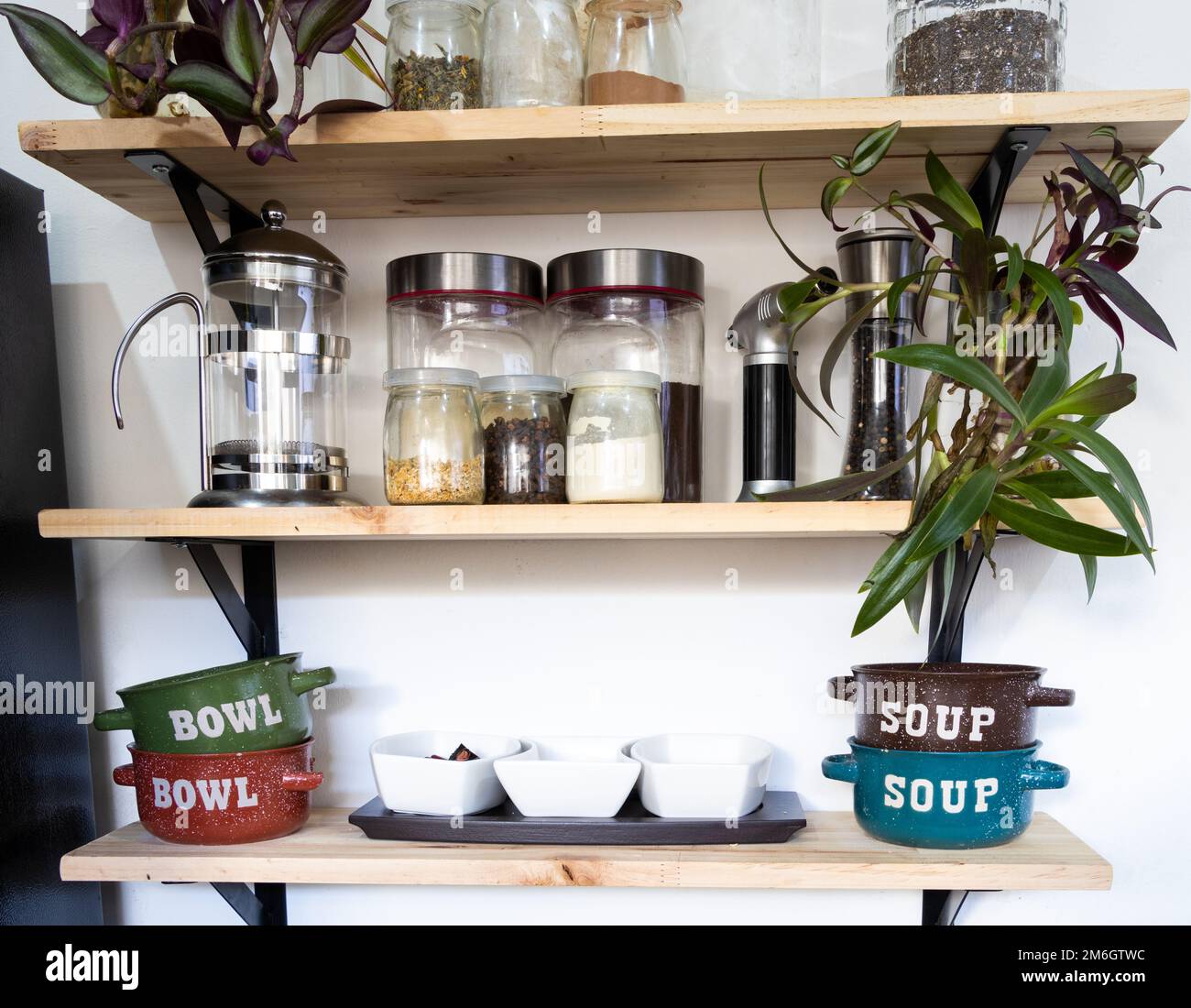 Kitchen ornaments and condiments with plants Stock Photo - Alamy