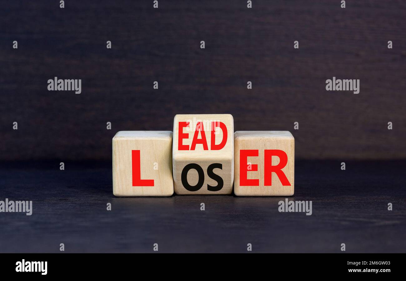 Leader or loser symbol. Concept word Leader Loser on wooden cubes ...