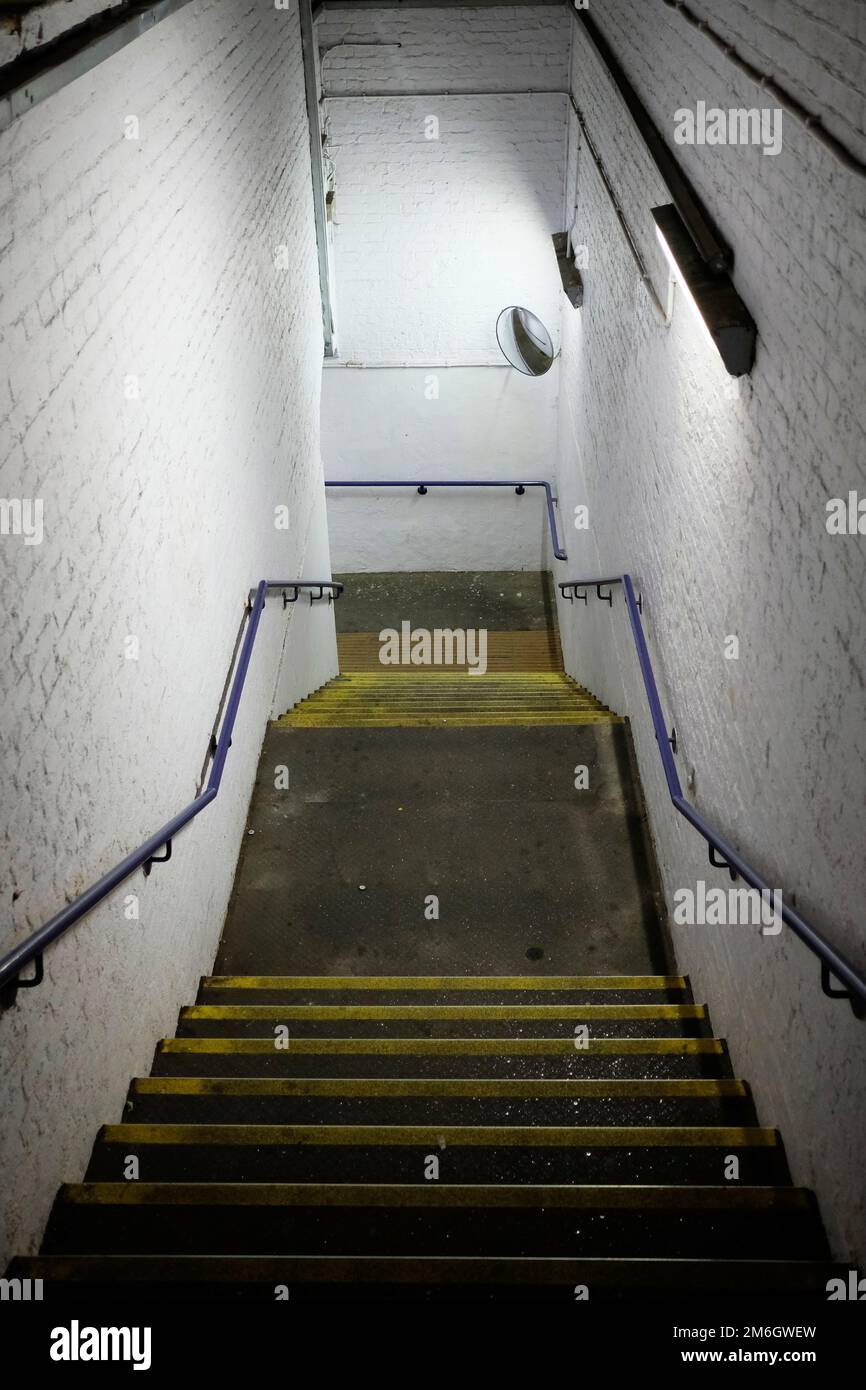 An empty underground subterranean railway station passage walkway Stock ...