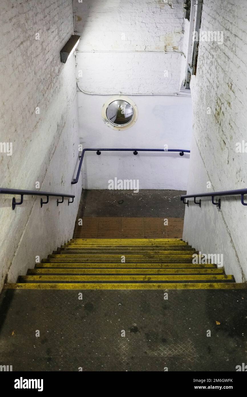 An empty underground subterranean railway station passage walkway Stock ...