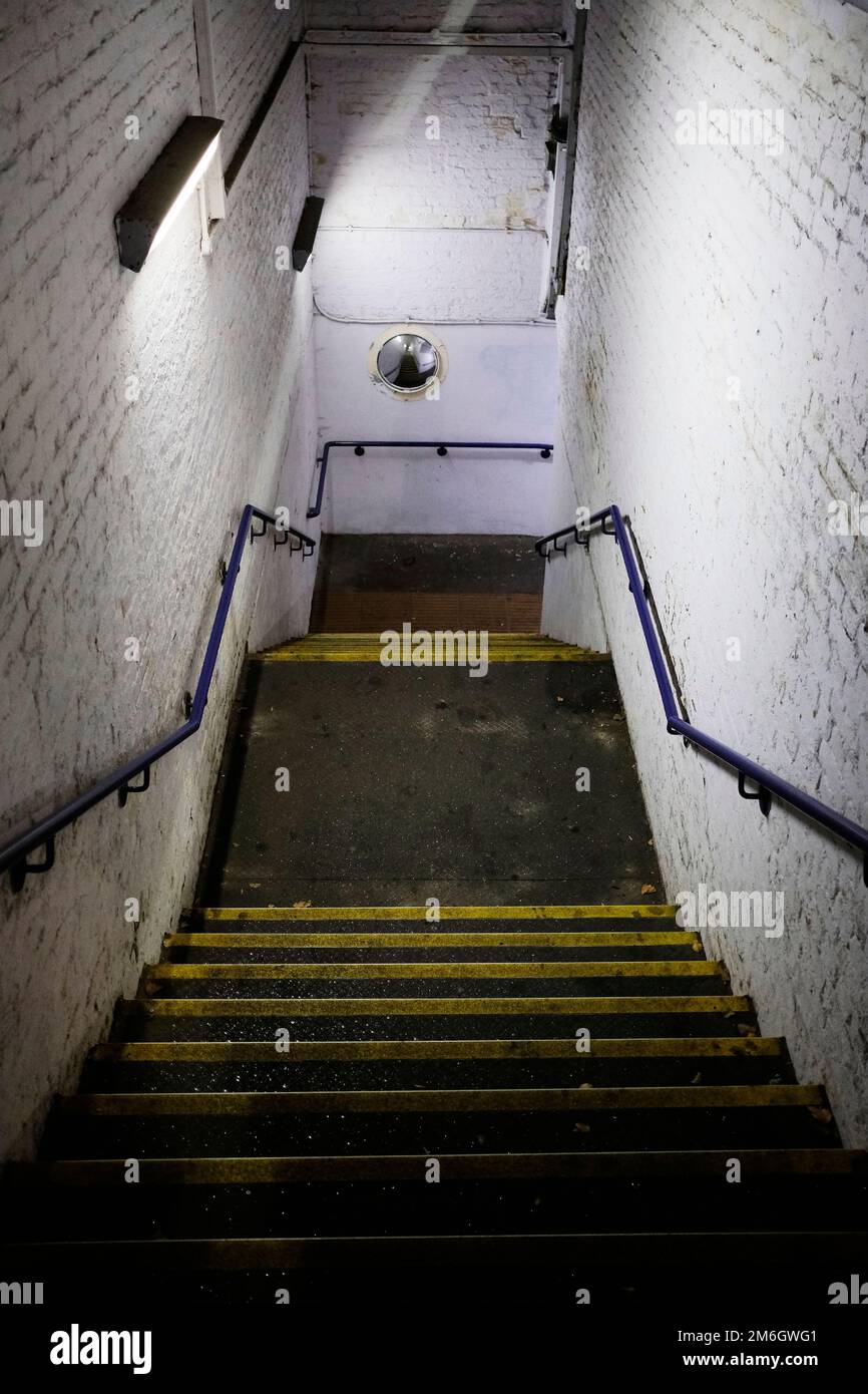 An empty underground subterranean railway station passage walkway Stock ...