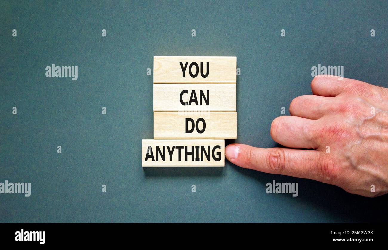 You can do anything symbol. Concept word You can do anything on wooden ...