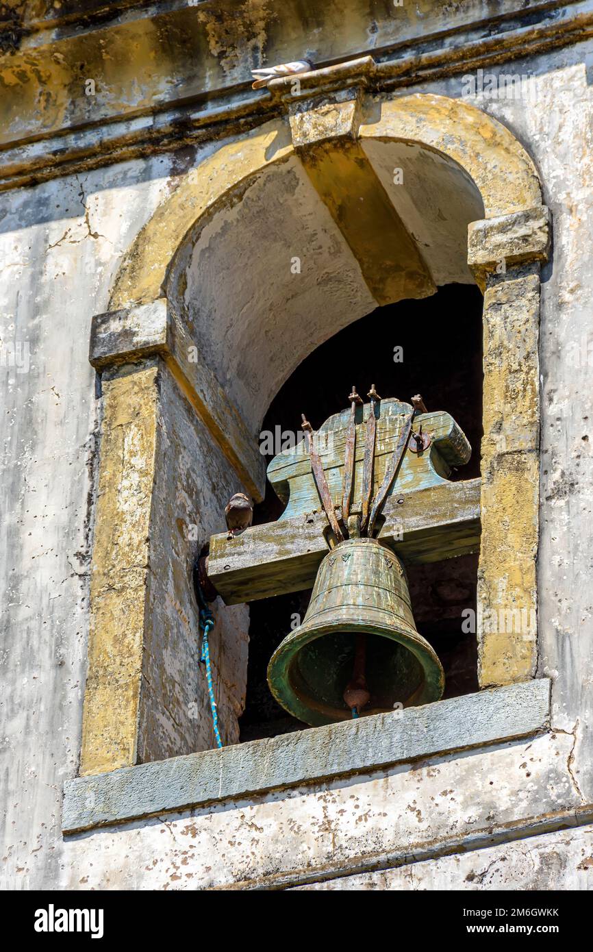Colonial-style church tower with old bell Stock Photo - Alamy