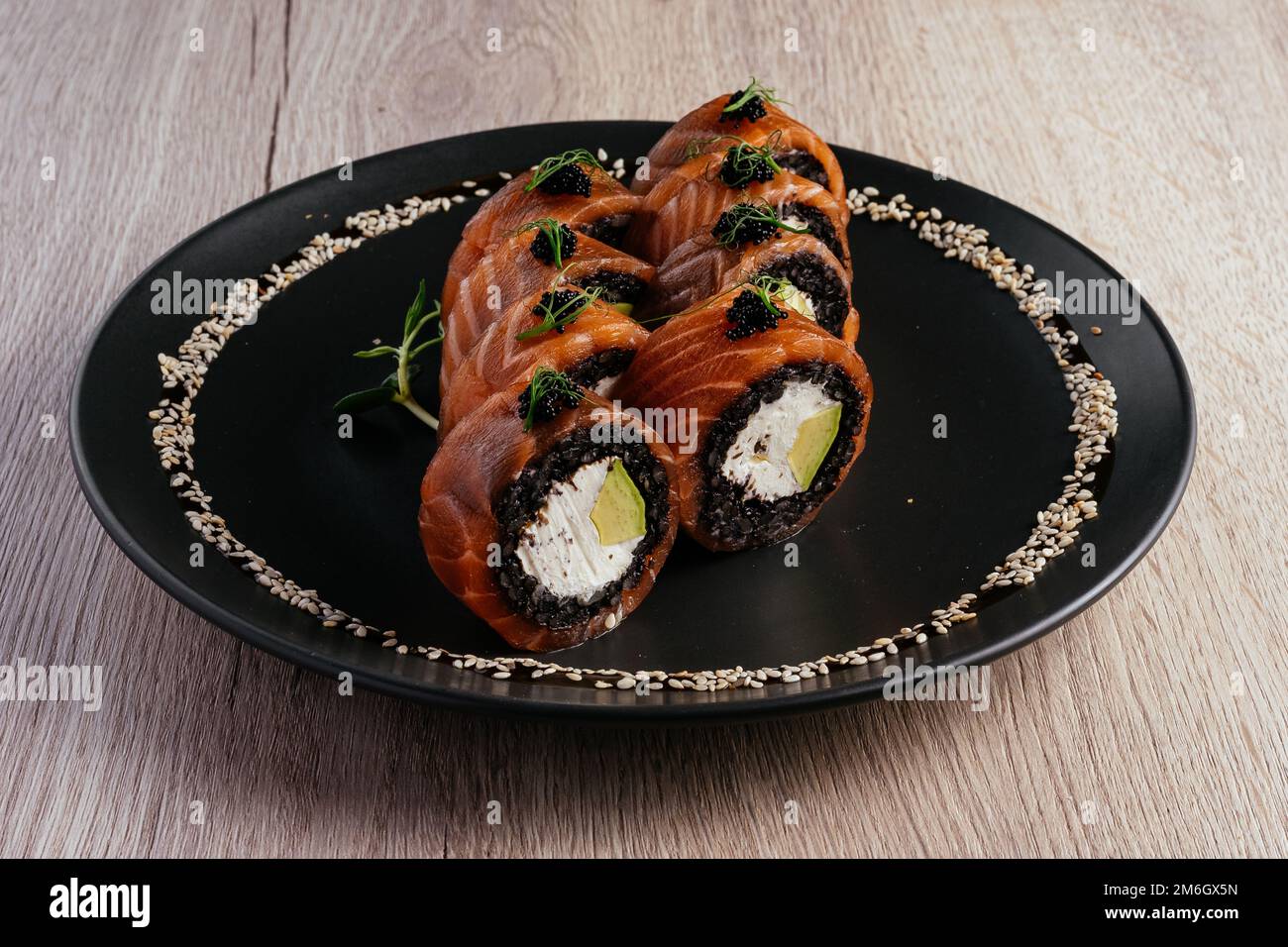 philadelphia sushi roll on a plate. asian restaurant menu Stock Photo ...