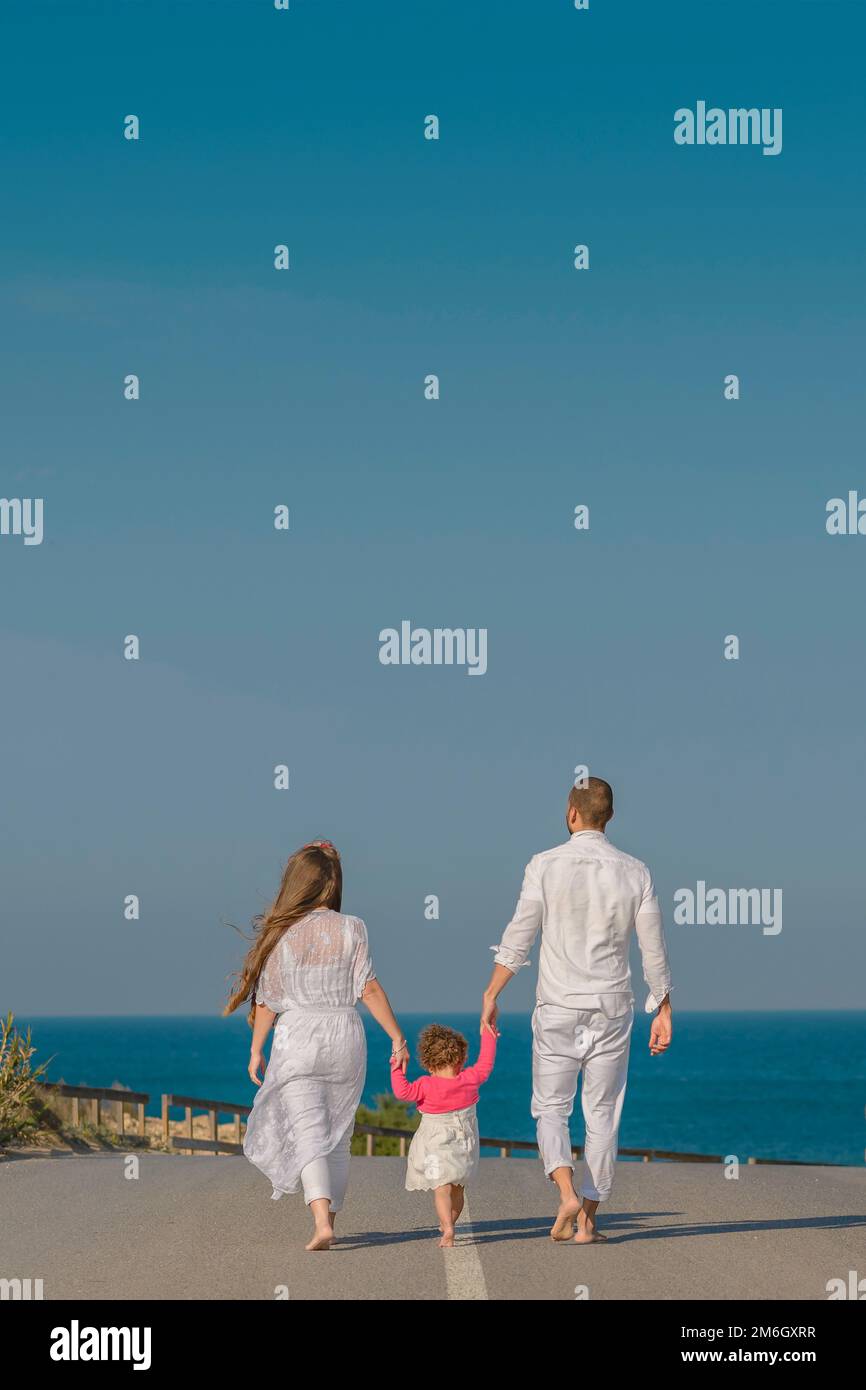 Family traveling having fun on the beaches in summer Stock Photo - Alamy