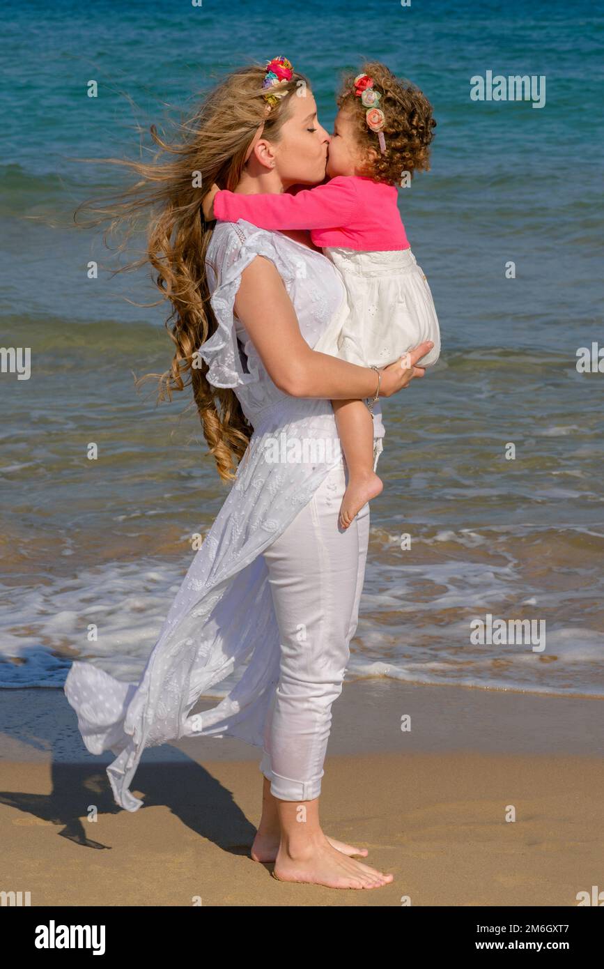 Family traveling having fun on the beaches in summer Stock Photo - Alamy