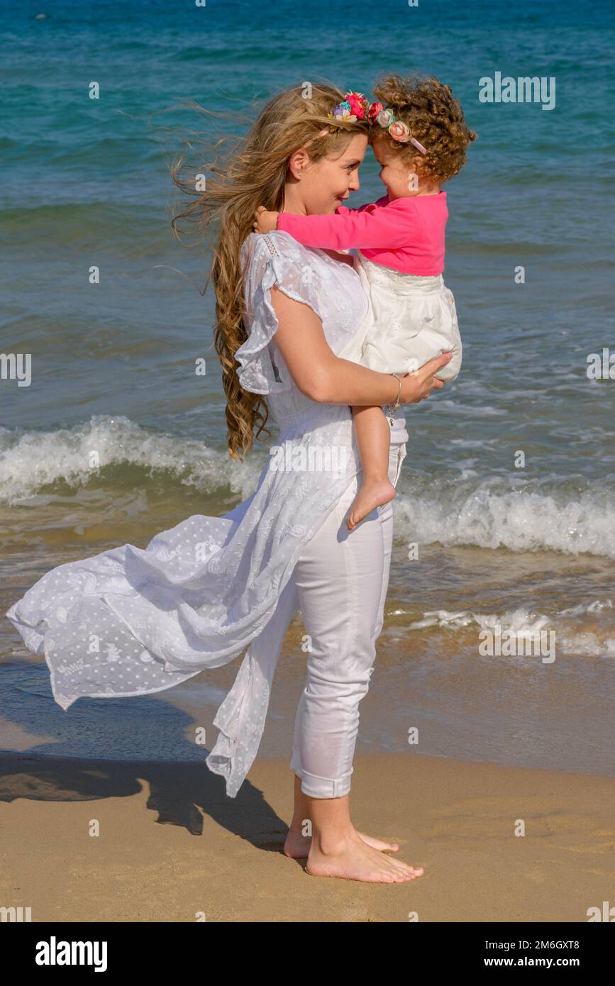 Family traveling having fun on the beaches in summer Stock Photo - Alamy