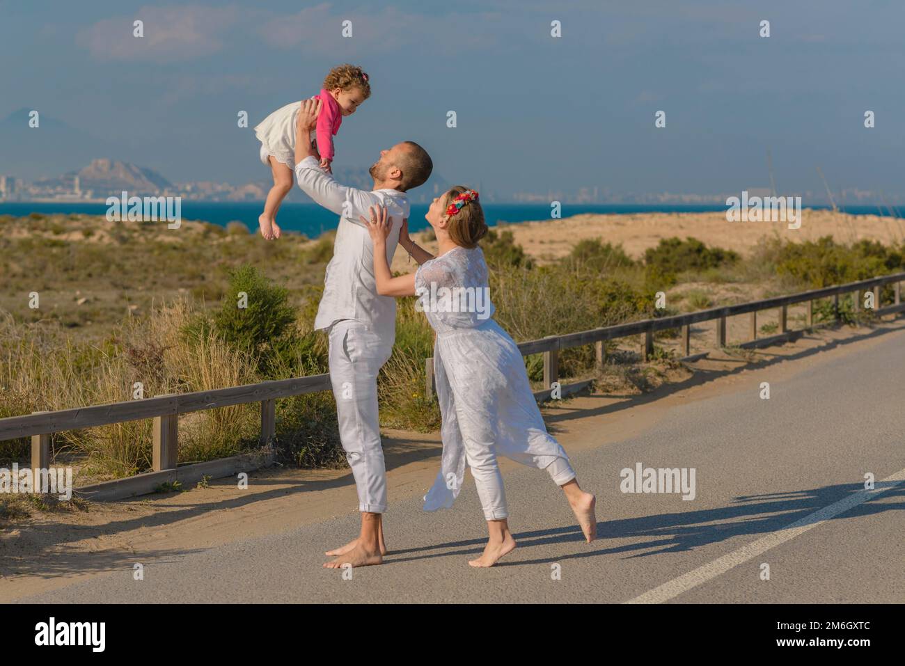 Family traveling having fun on the beaches in summer Stock Photo - Alamy