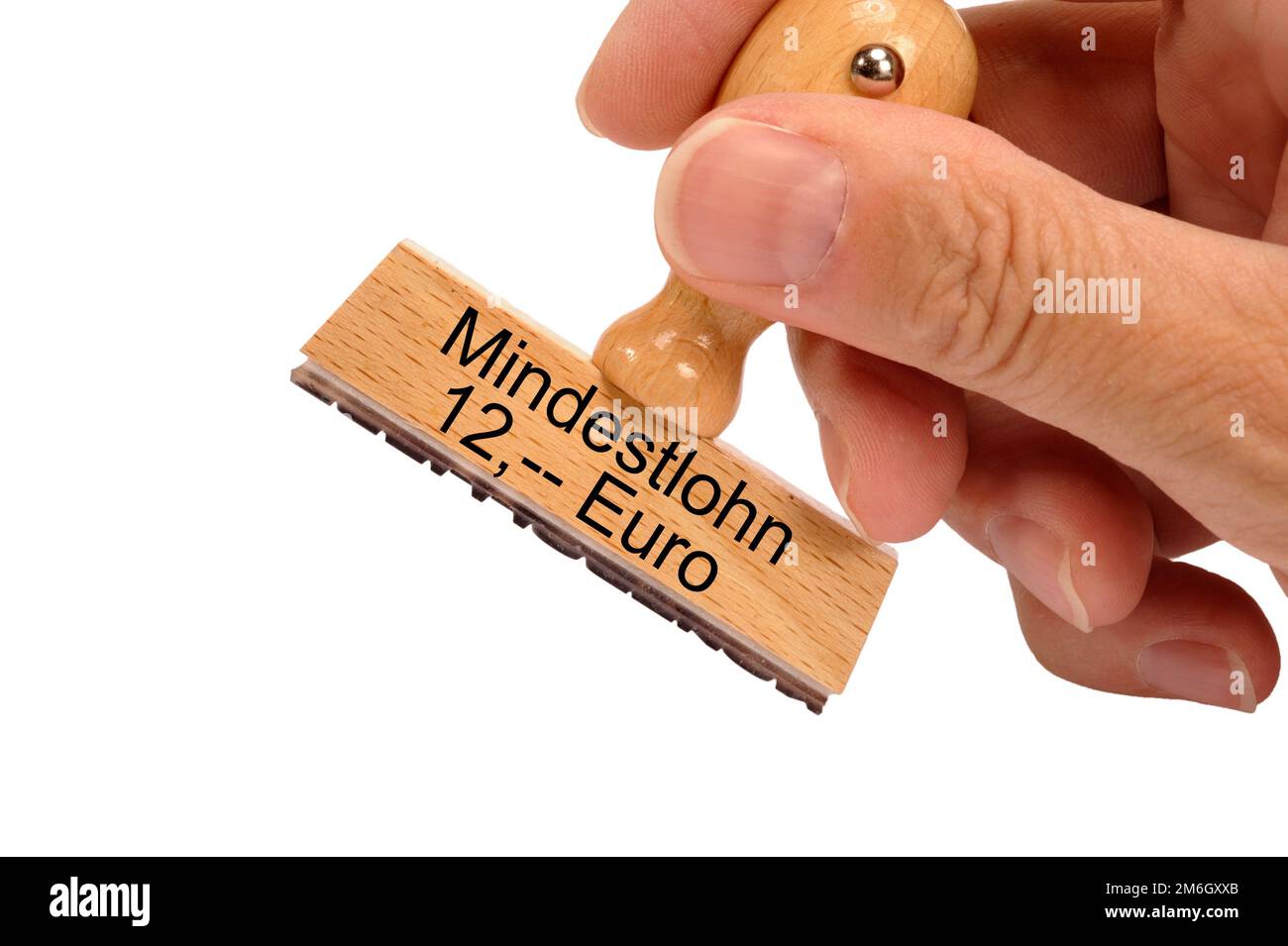 Minimum wage 12 euros printed on wooden stamp Stock Photo - Alamy
