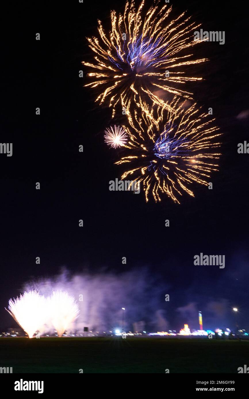 A long exposure with slow shutter speed of Fireworks exploding in the ...