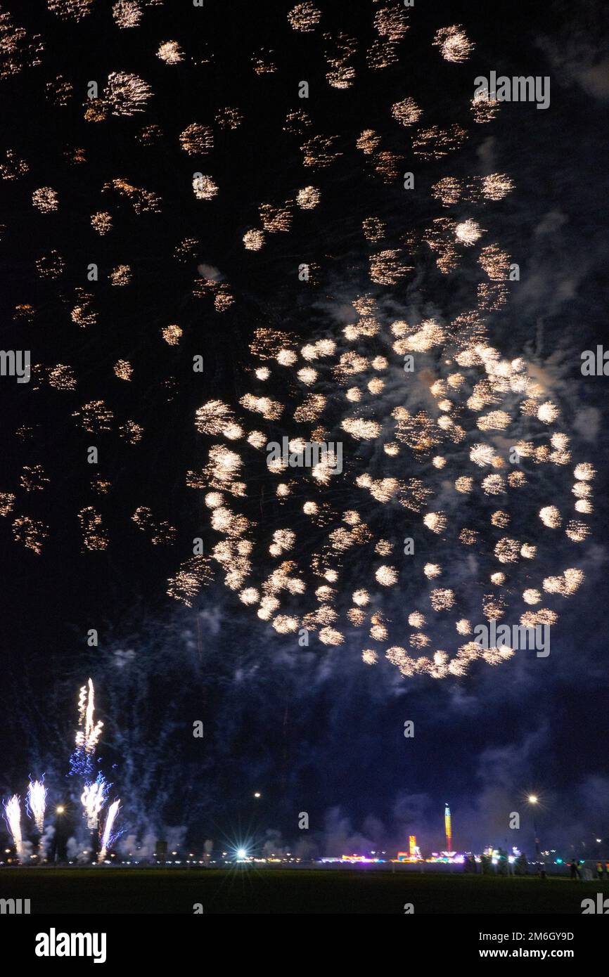 A long exposure with slow shutter speed of Fireworks exploding in the ...