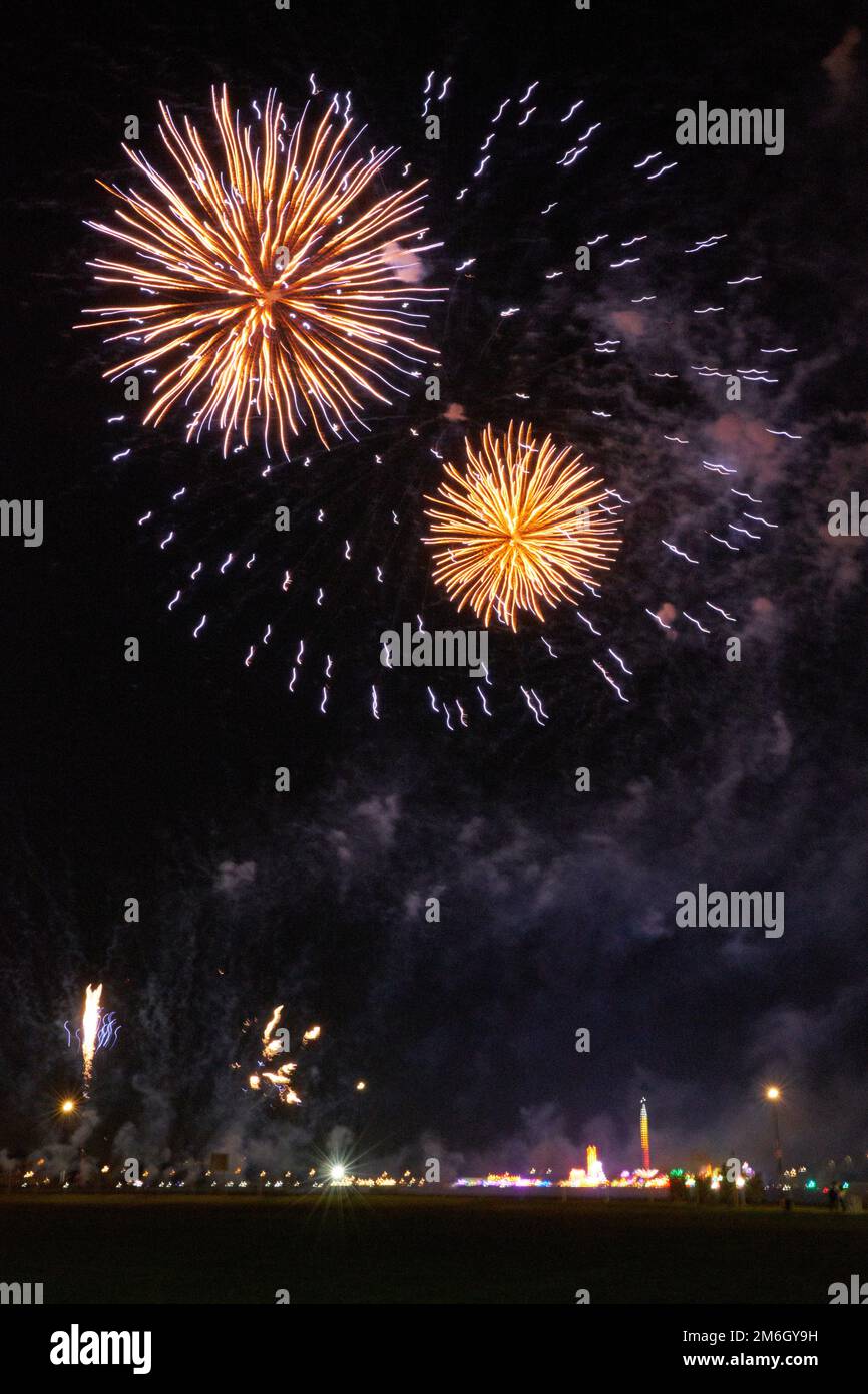 A long exposure with slow shutter speed of Fireworks exploding in the ...