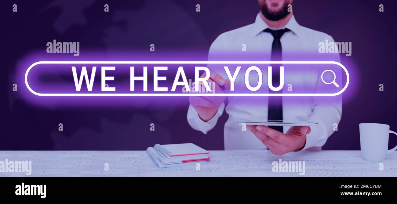Conceptual caption We Hear You. Business approach Listening intently ...