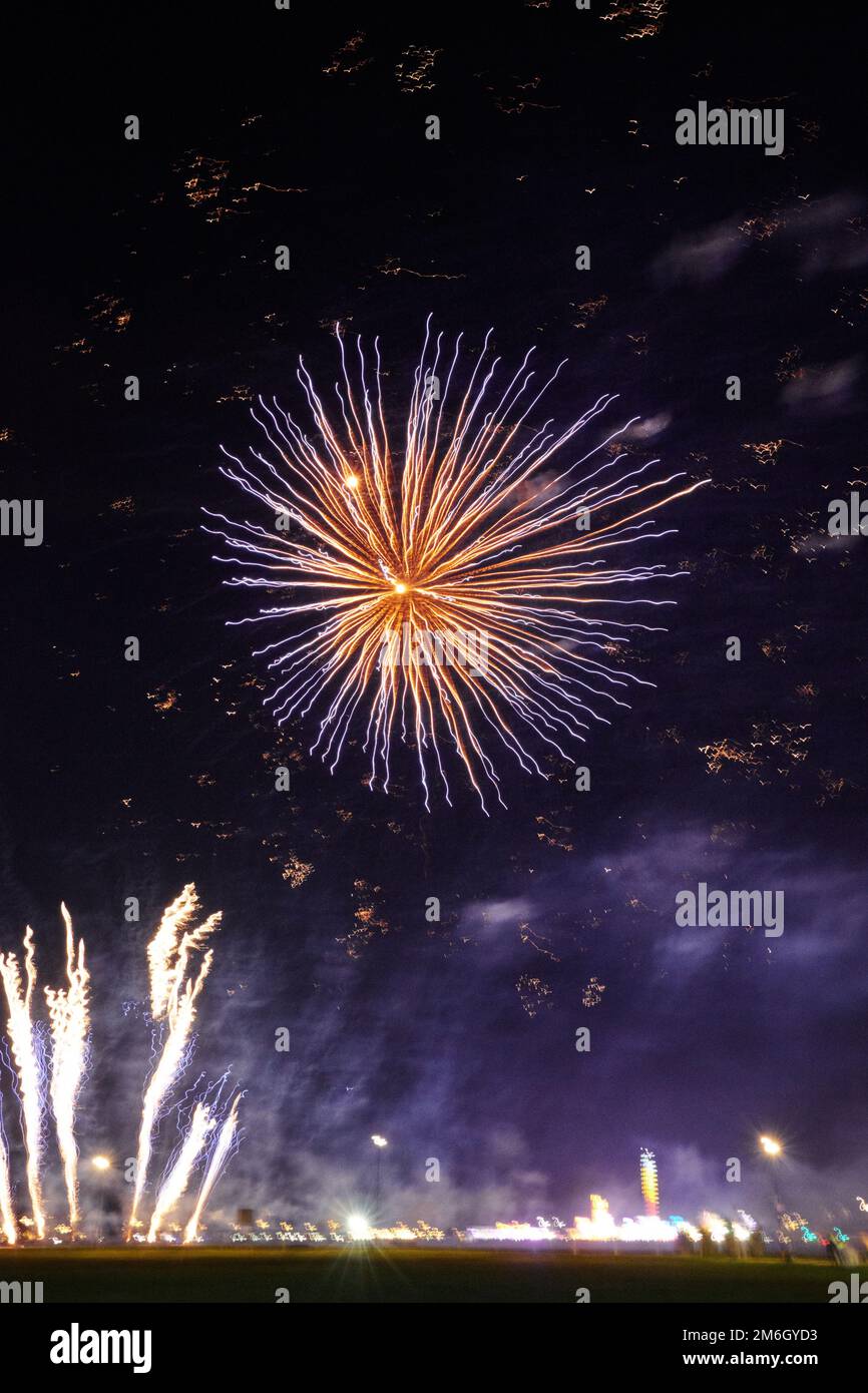 A long exposure with slow shutter speed of Fireworks exploding in the ...