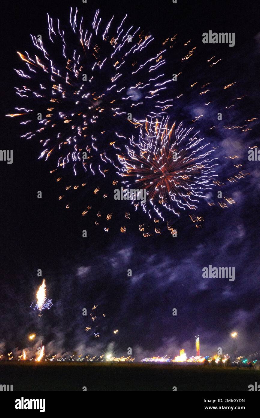 A long exposure with slow shutter speed of Fireworks exploding in the ...