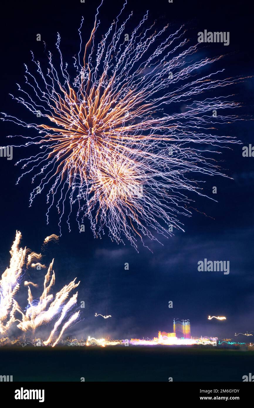 A long exposure with slow shutter speed of Fireworks exploding in the ...