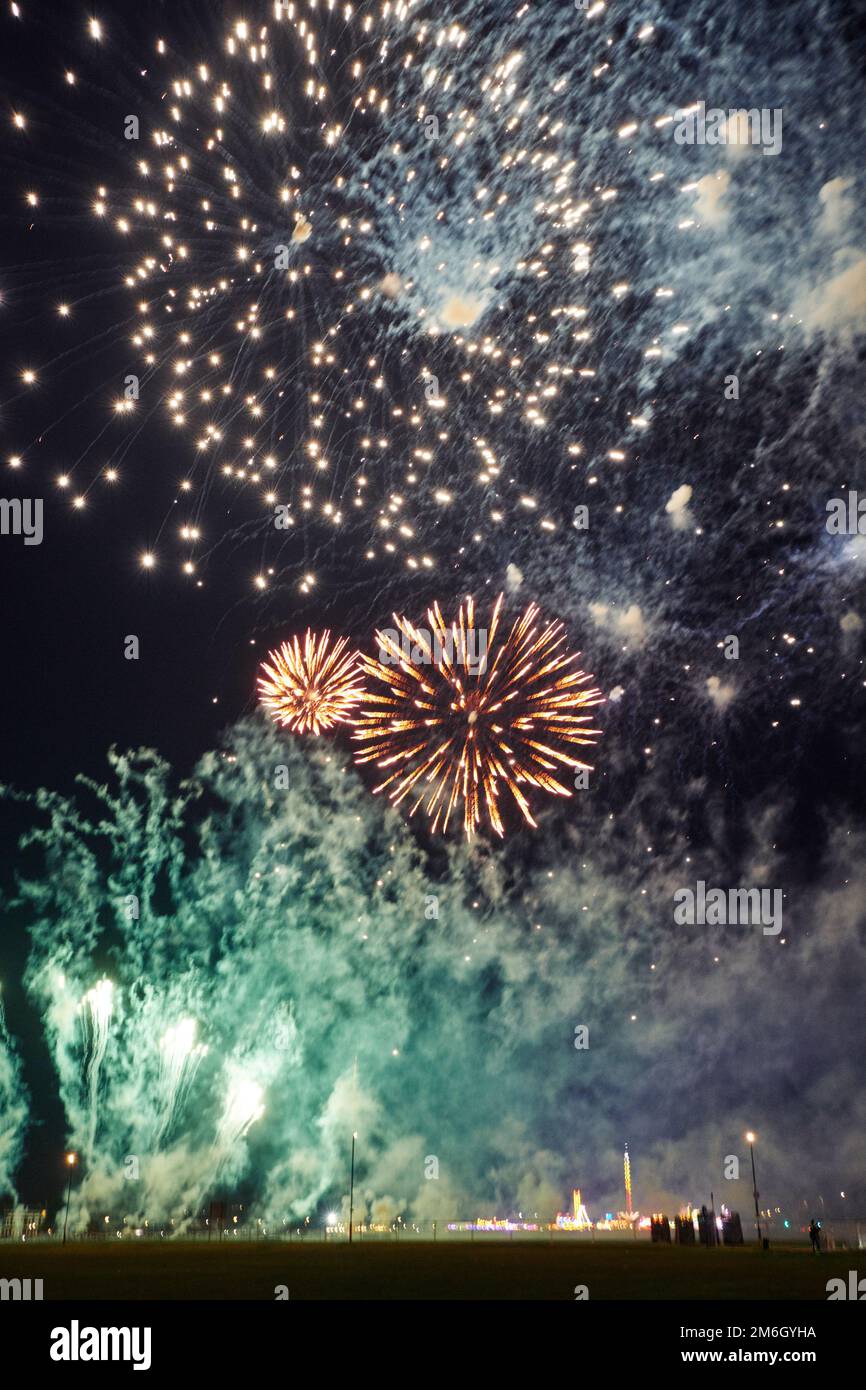 A long exposure with slow shutter speed of Fireworks exploding in the ...